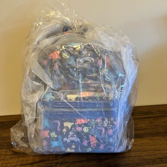 Loungefly | Bags | Loungefly Exclusive Disney Pixar Monsters Inc ...